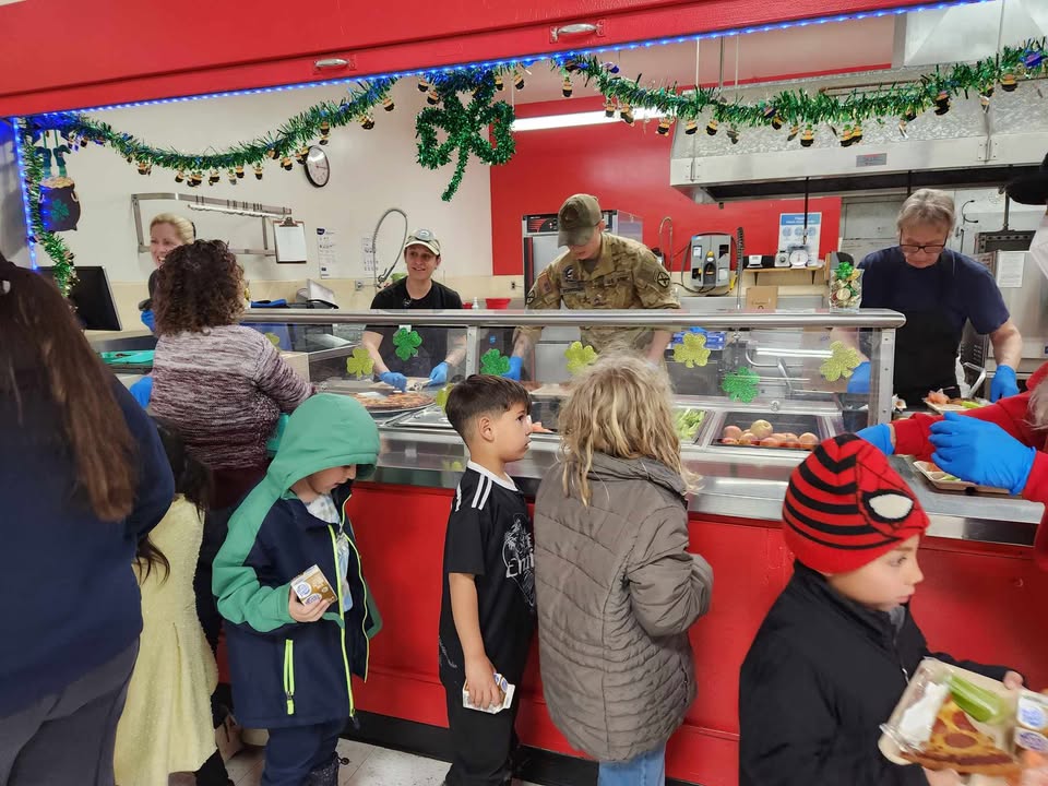 Army Corporal serves lunch at Fritsch Elementary in Carson City to show ...