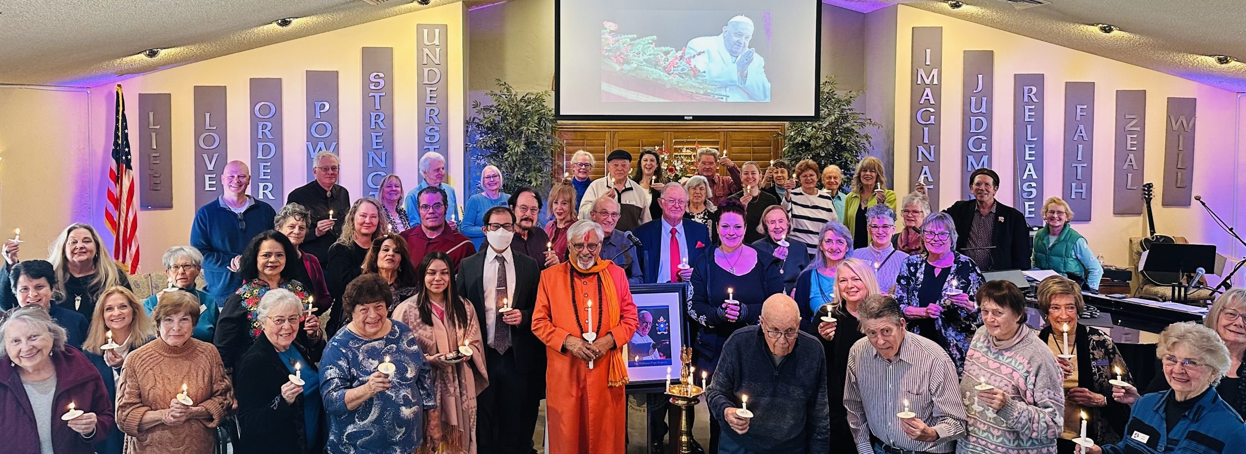 Diverse religions get together in a candlelight vigil to pray for ...